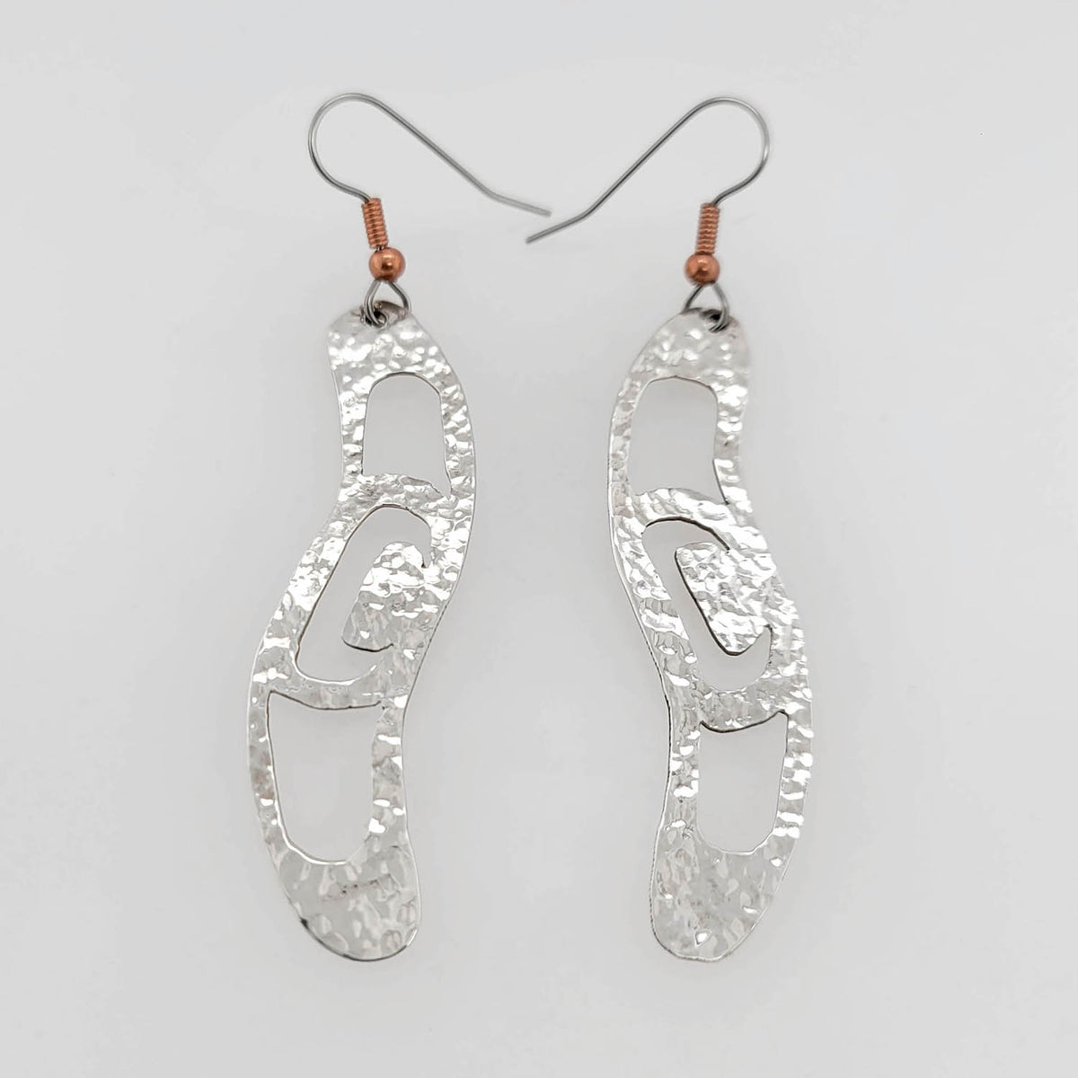 Silver Hammered Abstract Earrings by Toby Cook, Kwakwaka'wakw – Spirits ...